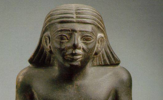 Statue of Prince Tjau Seated on the Ground - Egypt Museum